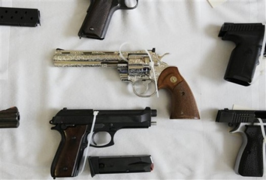 Authorities announce 23 arrests in gun probe | Chicago Defender